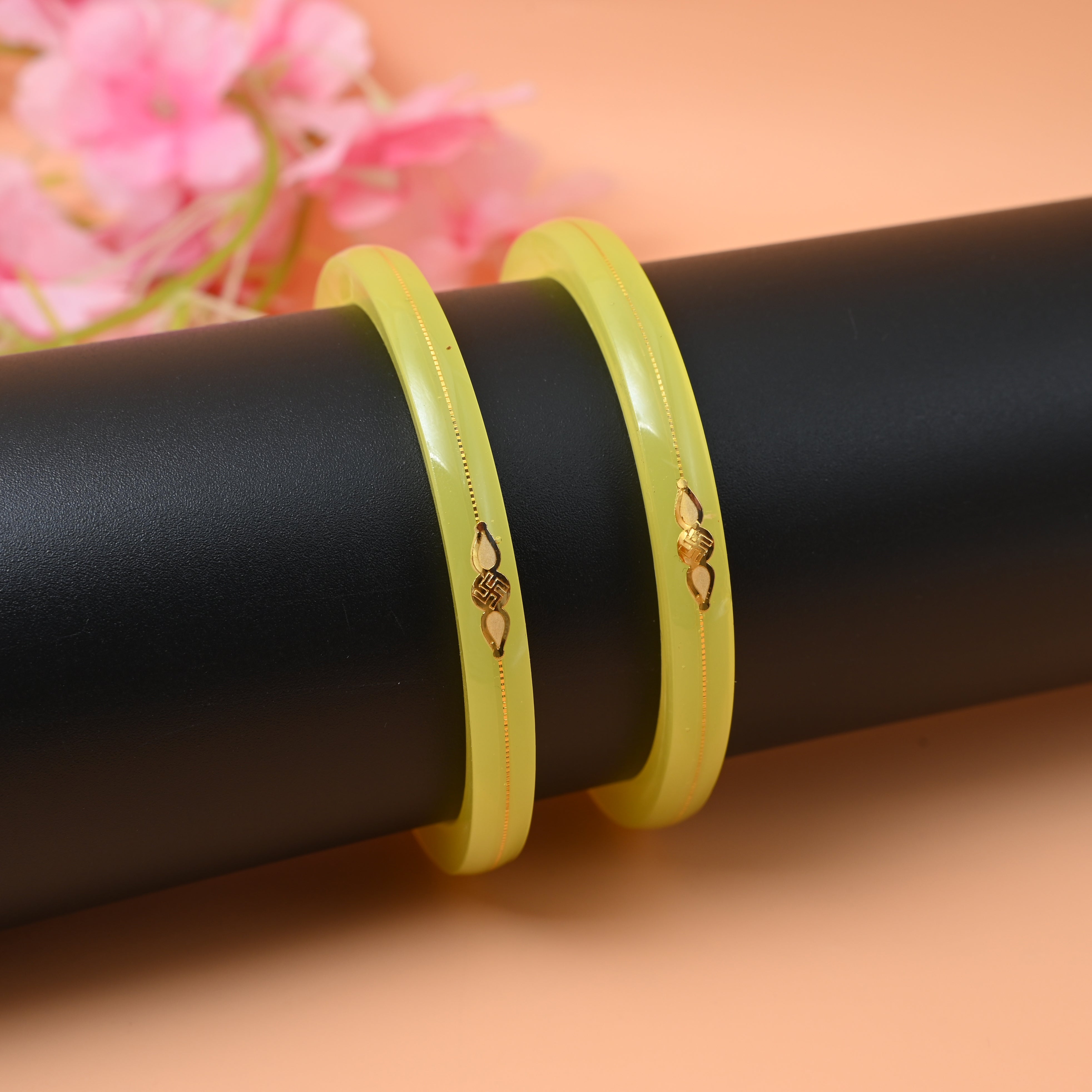 Gold Small Swastika Design Yellow Bangle. – Misvi